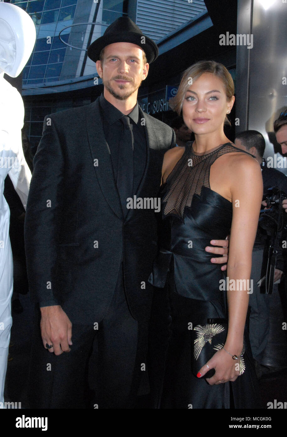 LOS ANGELES, CA - APRIL 16: (L-R) Actor Gustaf Skarsgard and Caroline ...