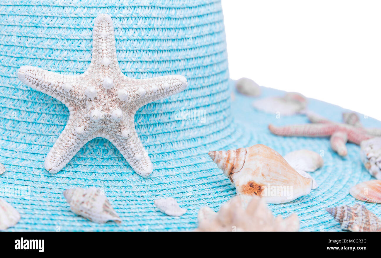 Starfish and seashells on a hat Stock Photo - Alamy