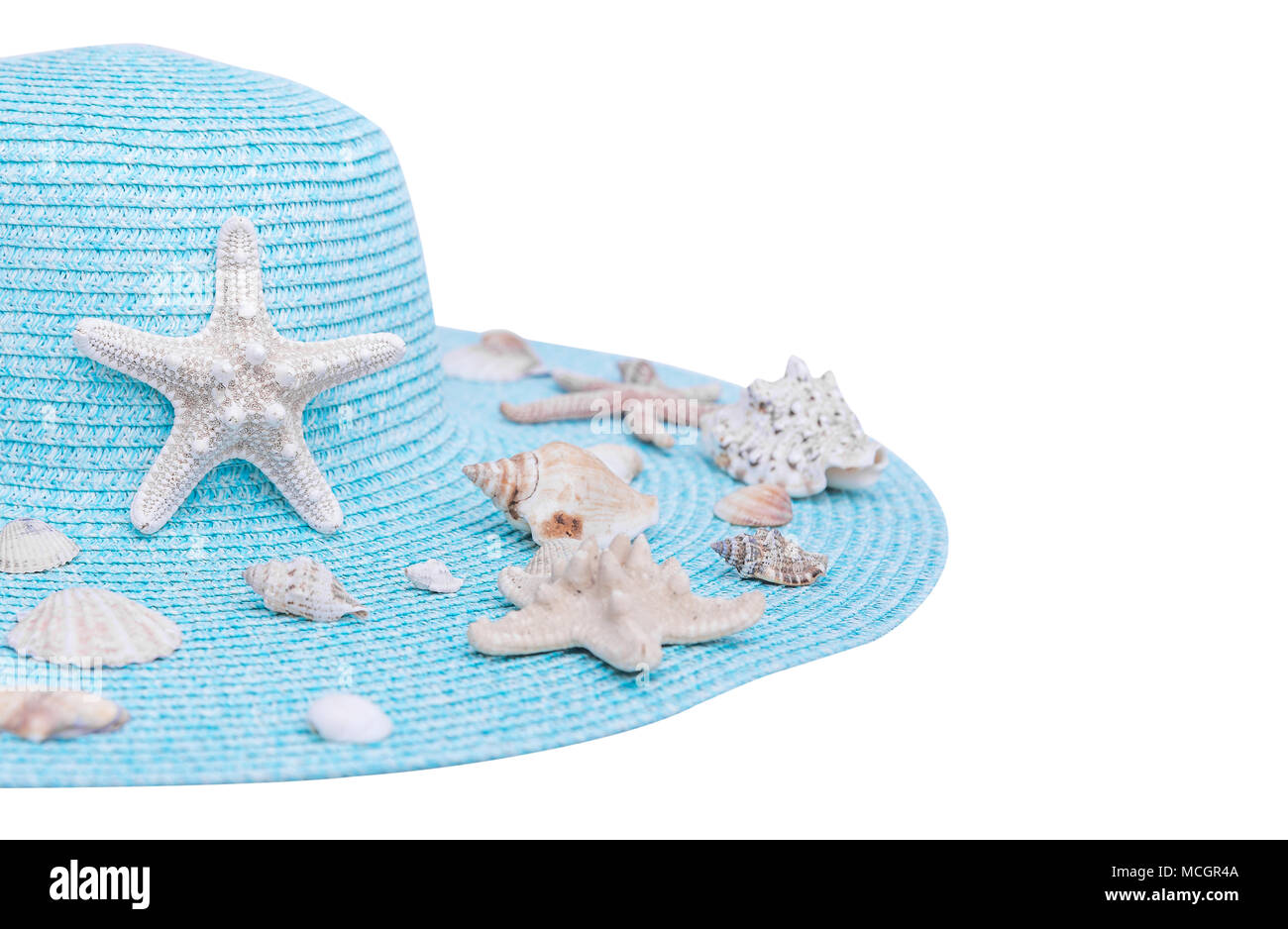 Starfish and seashells on a hat Stock Photo - Alamy