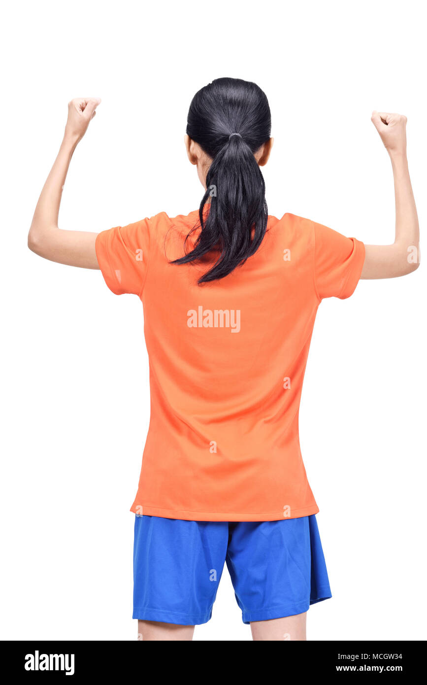 Back view of asian footballer woman with excited expression isolated ...