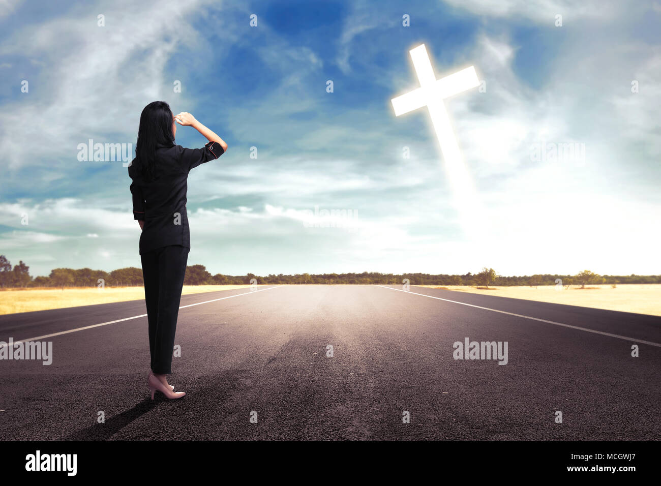 Standing looking at cross jesus hi-res stock photography and images - Alamy
