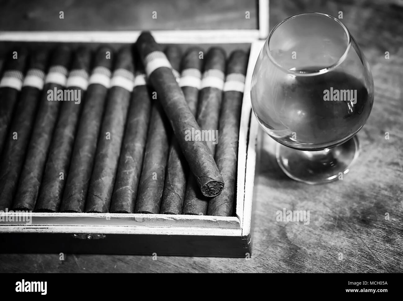 Retro styled photo of large box of Cuban cigars on a wooden tabl Stock ...