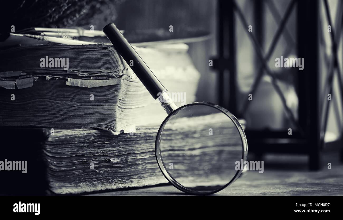 An old retro book on the table. An encyclopedia of the past on a Stock ...