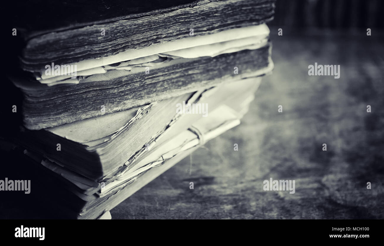 An old retro book on the table. An encyclopedia of the past on a Stock ...