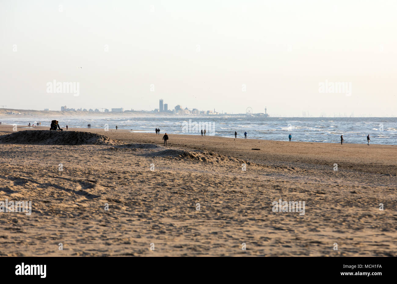 Katwijk, Netherlands - April 23, 2017: People are walking on a sunny ...