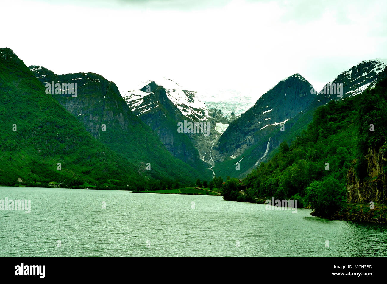 Landscapes of Norway with its mountains and green fields Stock Photo ...