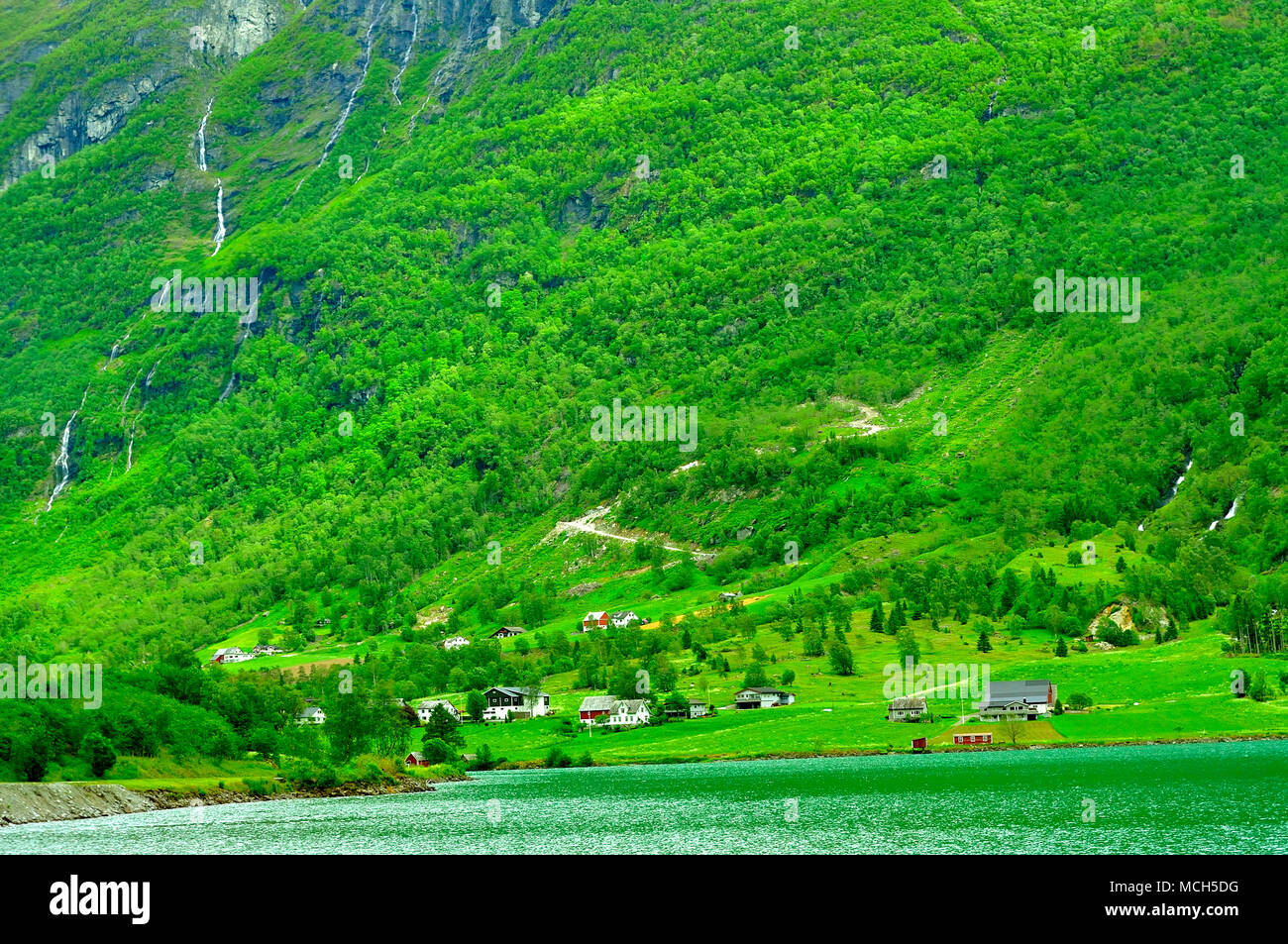 Landscapes of Norway with its mountains and green fields Stock Photo ...
