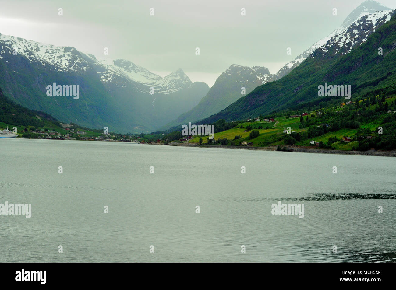 Landscapes of Norway with its mountains and green fields Stock Photo ...