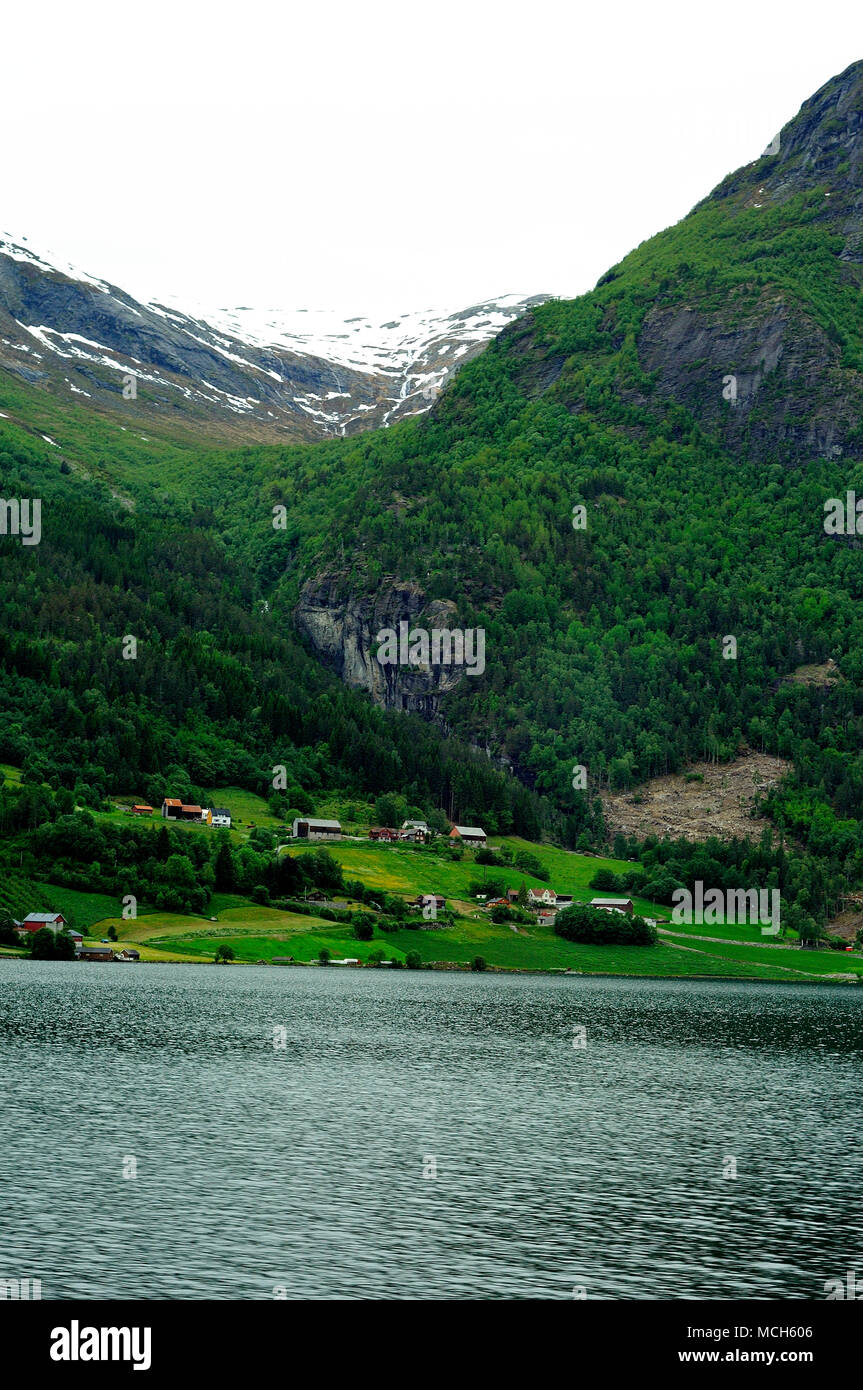 Landscapes of Norway with its mountains and green fields Stock Photo ...