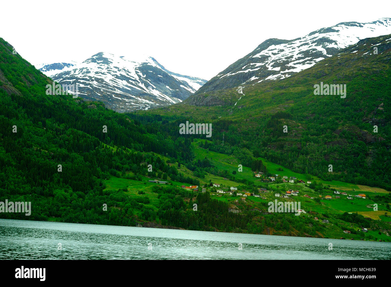 Landscapes of Norway with its mountains and green fields Stock Photo ...