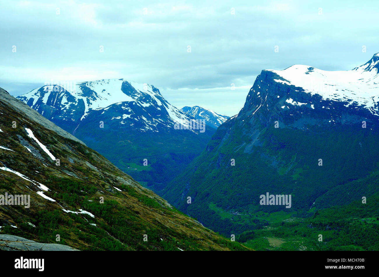 Landscapes of Norway with its mountains and green fields Stock Photo ...