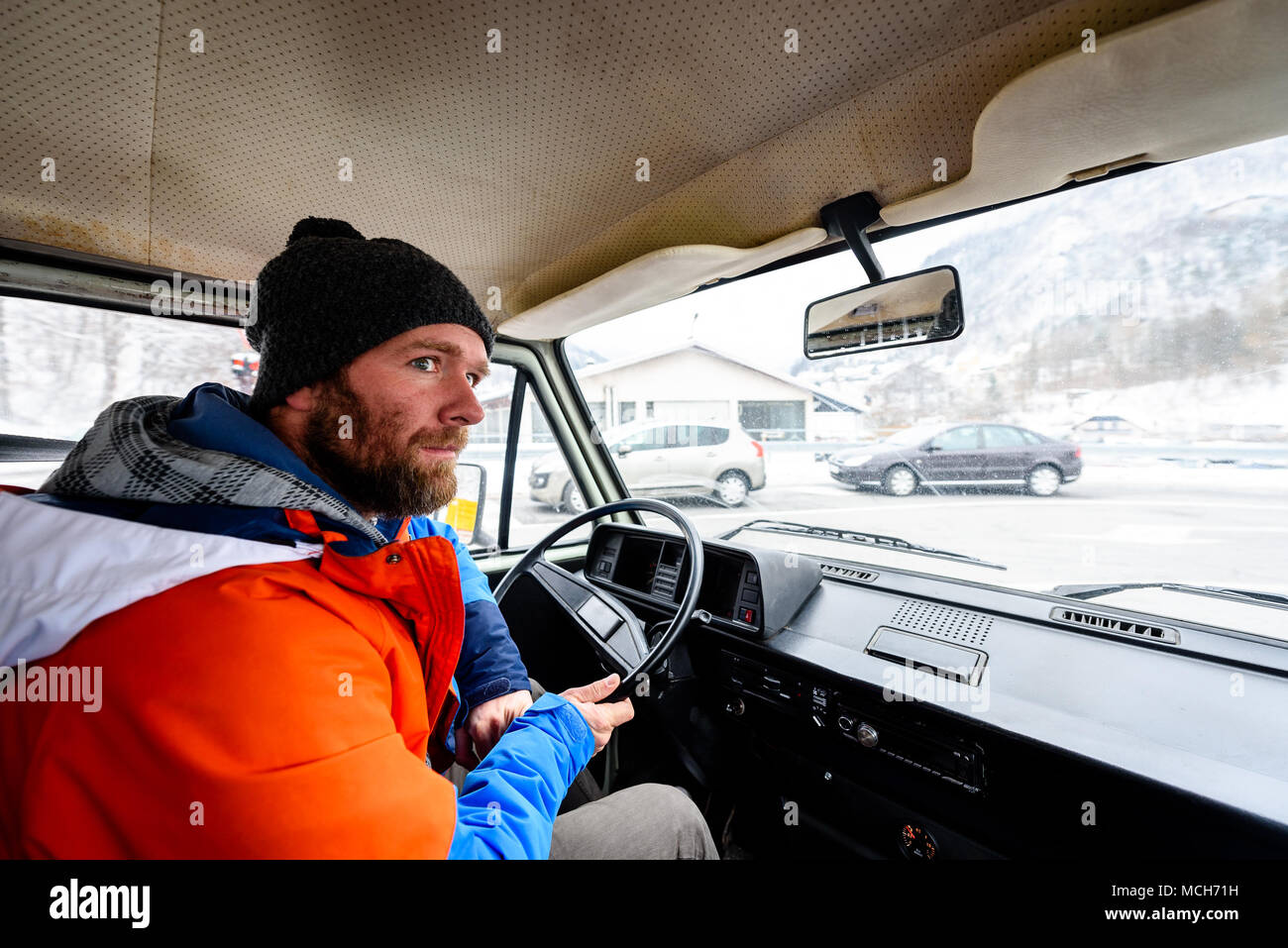 Interior view of delivery man driving a van or truck. Delivery ...