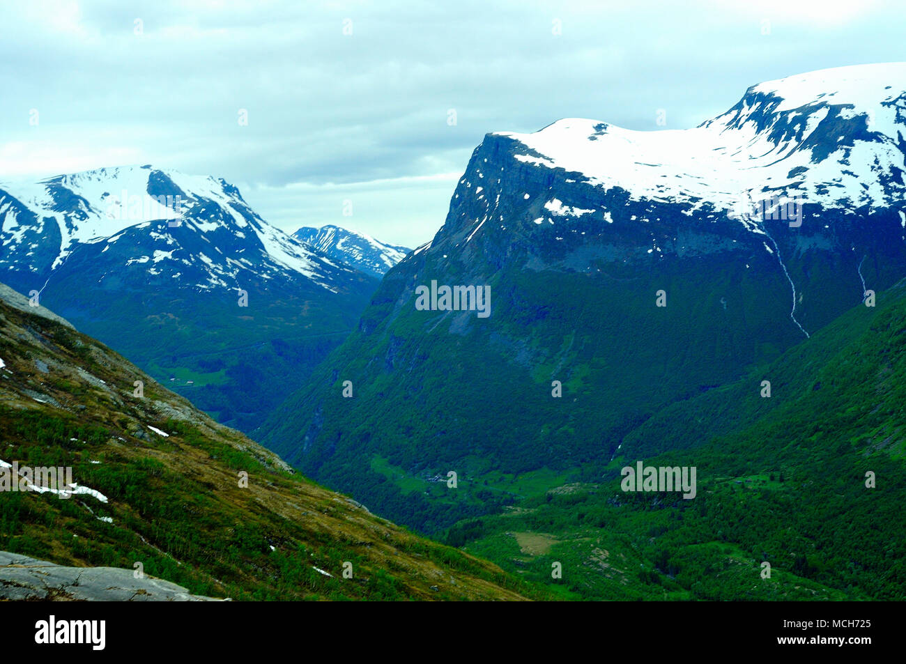 Landscapes of Norway with its mountains and green fields Stock Photo ...
