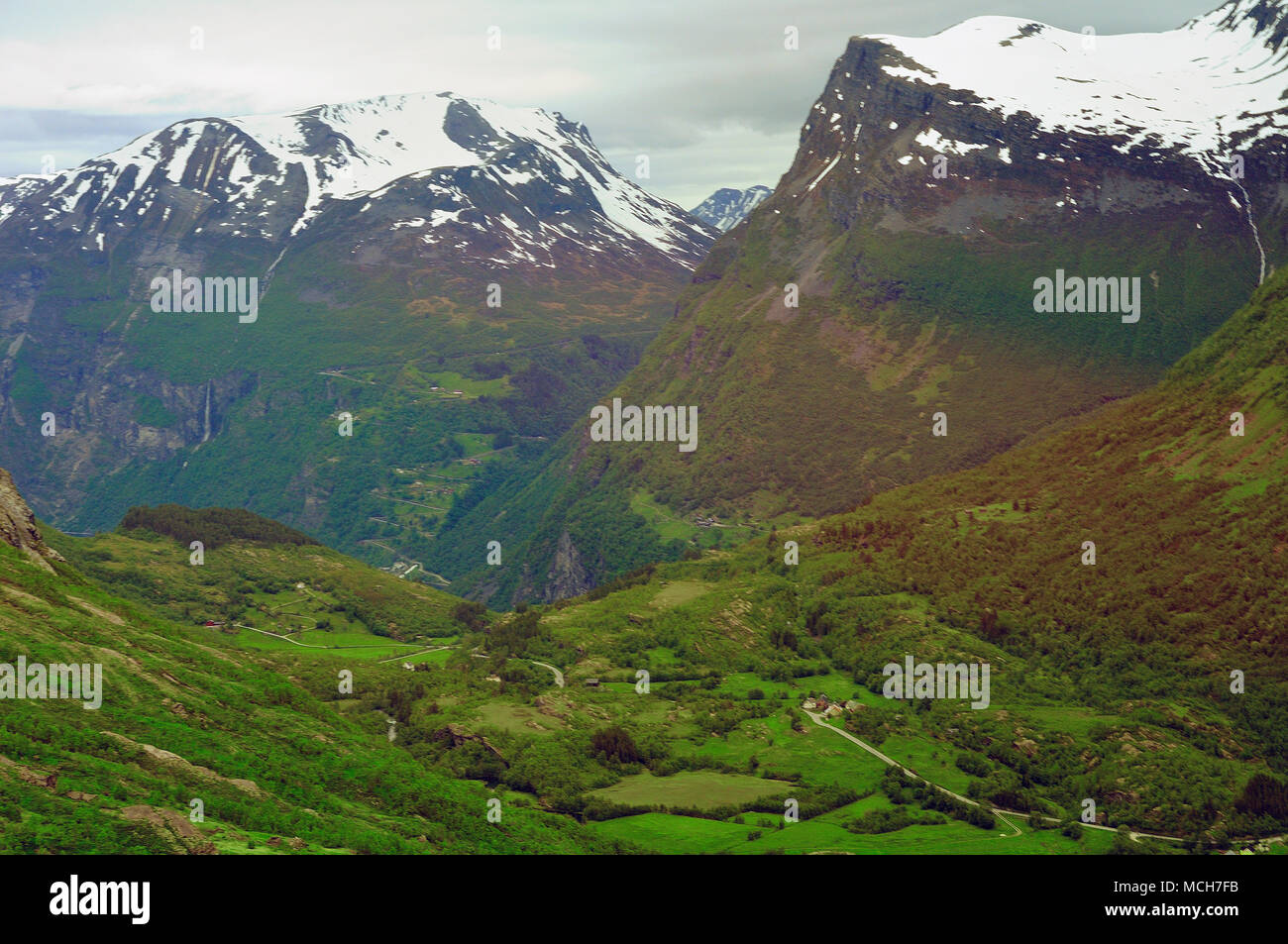 Landscapes of Norway with its mountains and green fields Stock Photo ...