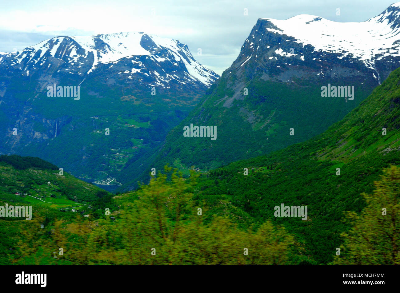 Landscapes of Norway with its mountains and green fields Stock Photo ...