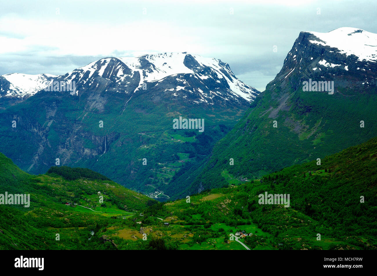 Landscapes of Norway with its mountains and green fields Stock Photo ...