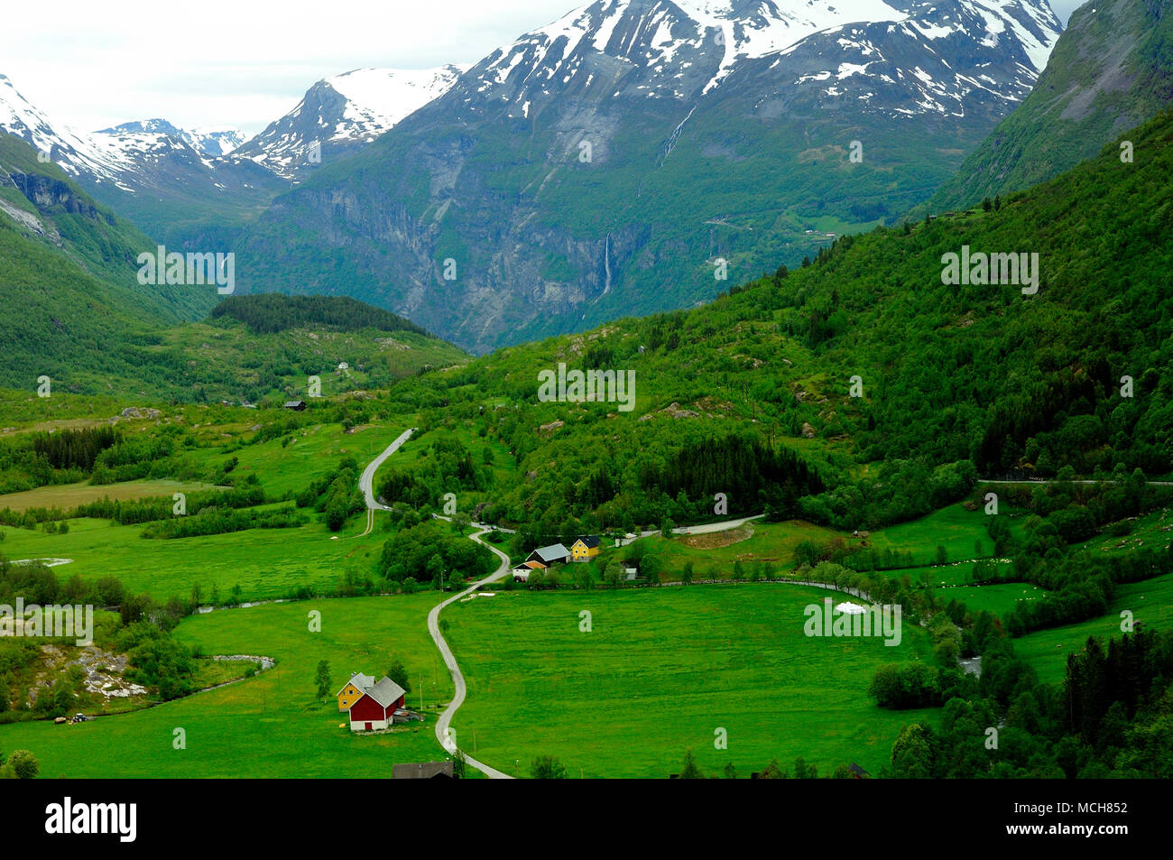 Landscapes of Norway with its mountains and green fields Stock Photo ...