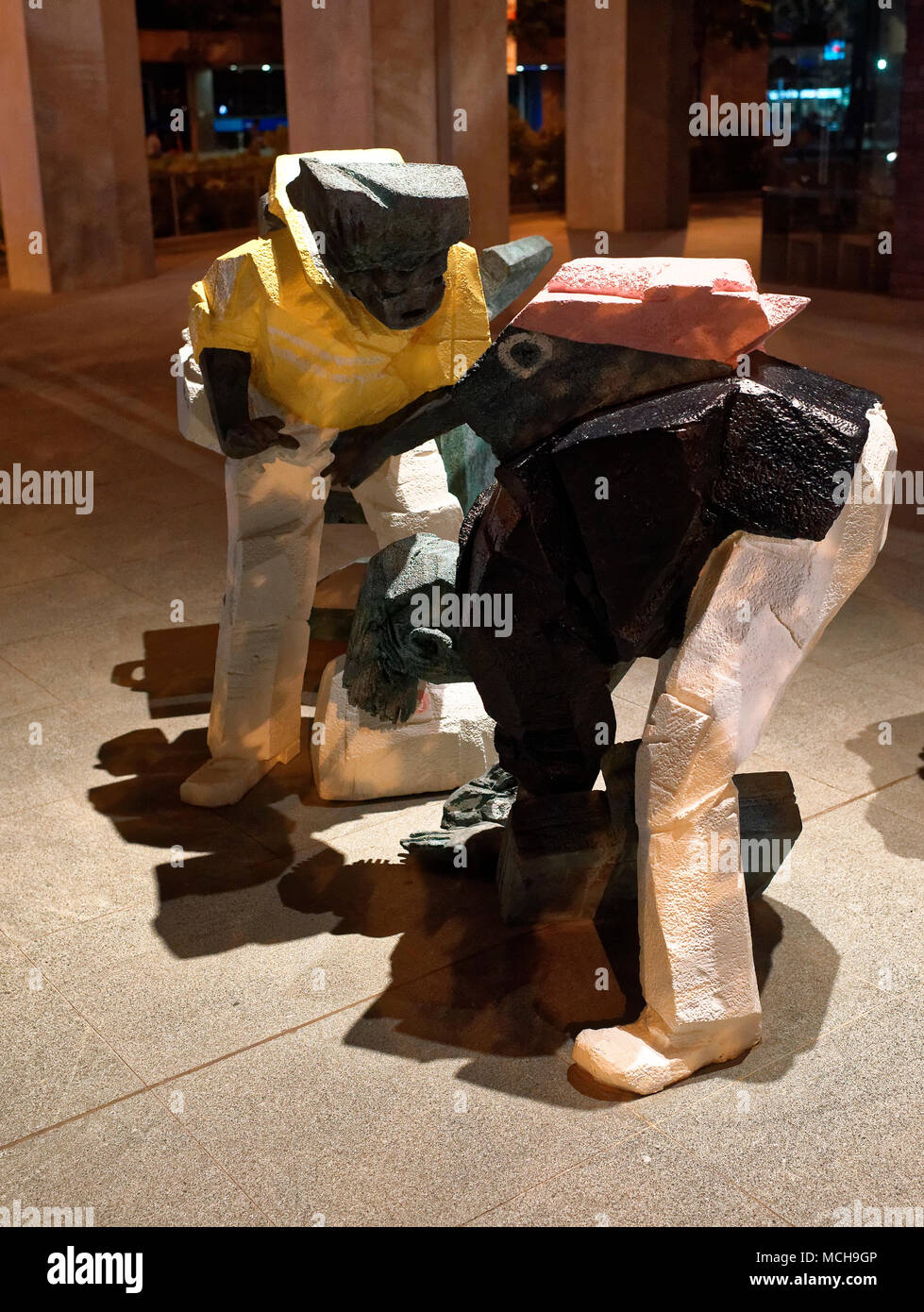 Statues on the street, blocky and surreal, Singapore business district ...