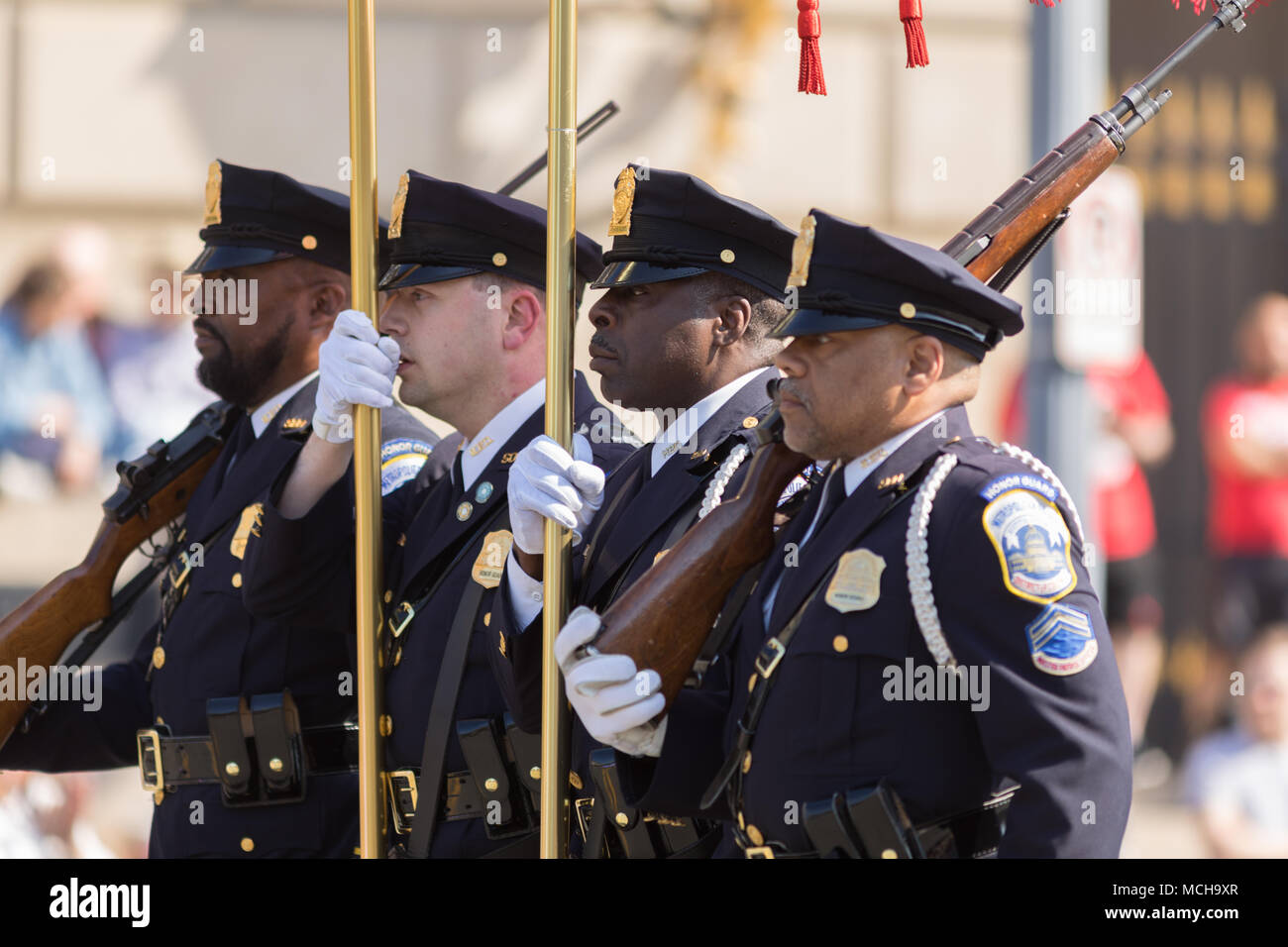 Washington, D.C., USA - April 14, 2018 Police officers marching with ...