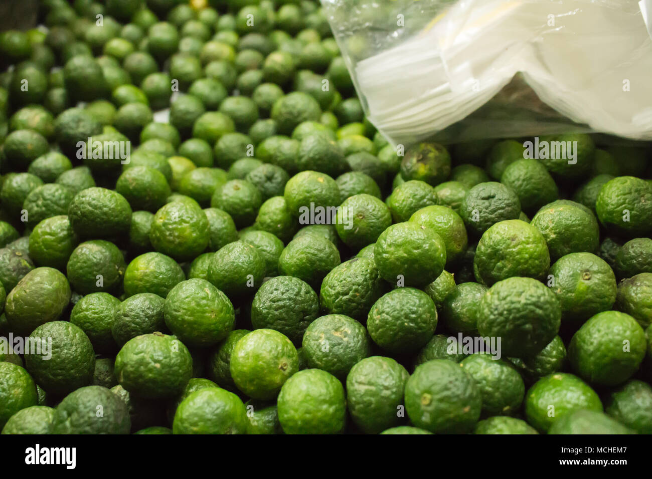 green lime from traditional markets indonesia Stock Photo - Alamy