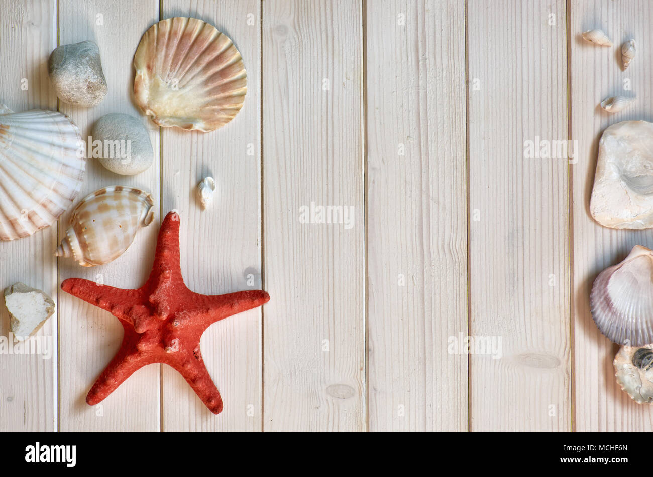 Maritime Decorations - stones, shells and knots - on light wooden ...