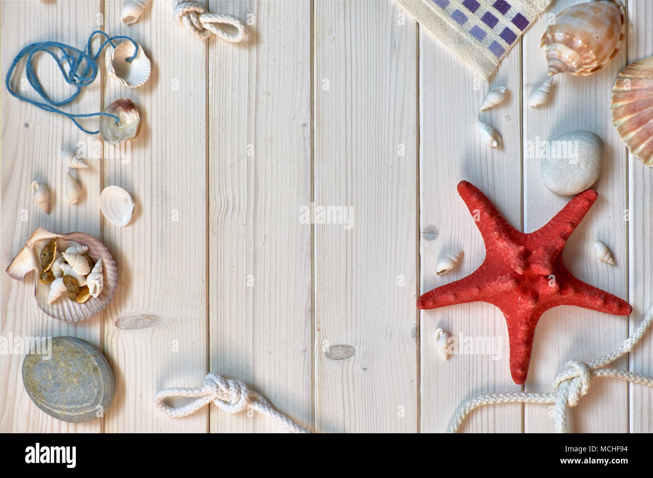 Maritime Decorations - stones, shells and knots - on light wooden ...