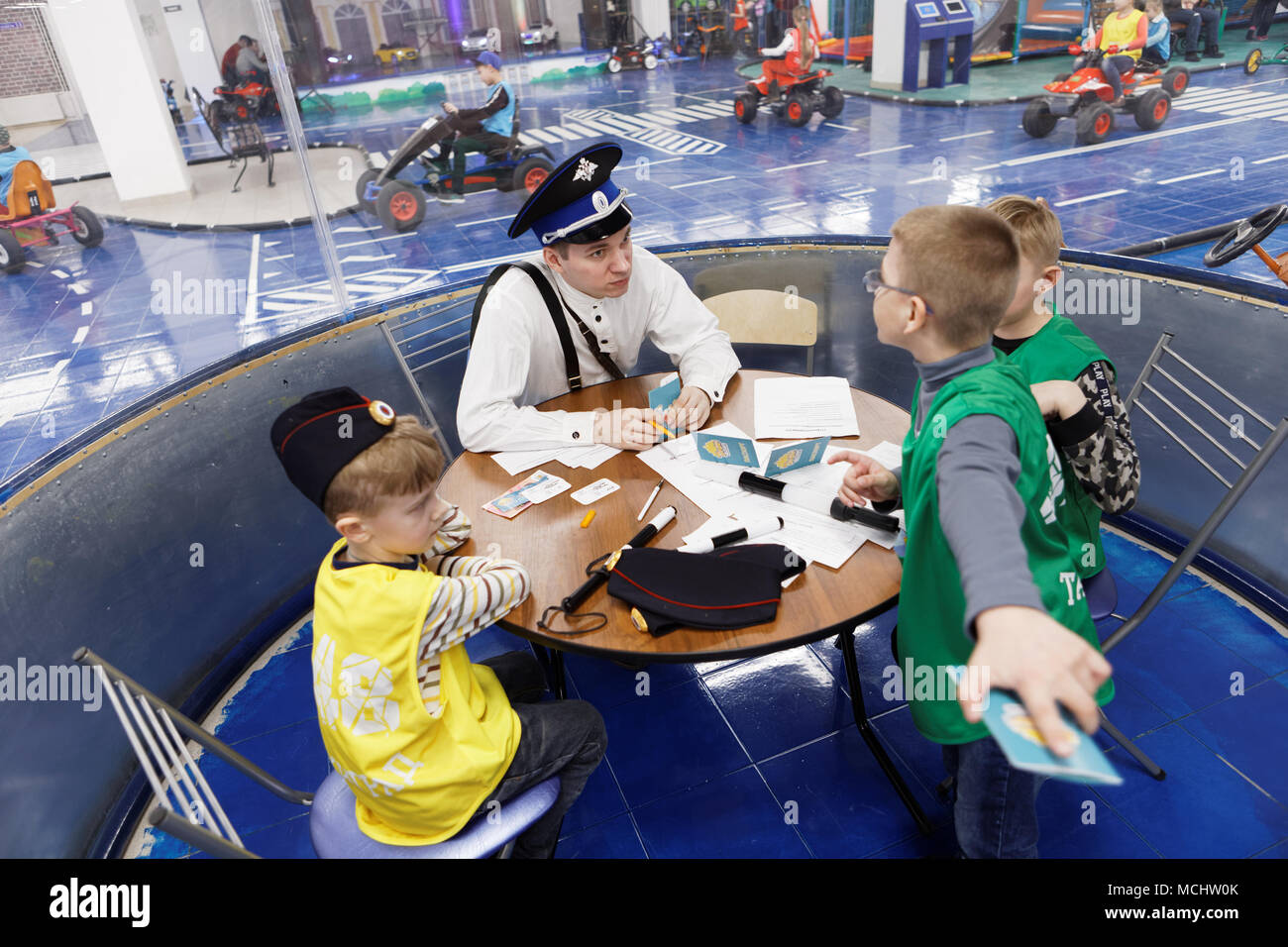St. Petersburg, Russia - April 5, 2018: Traffic officer issuing driver ...