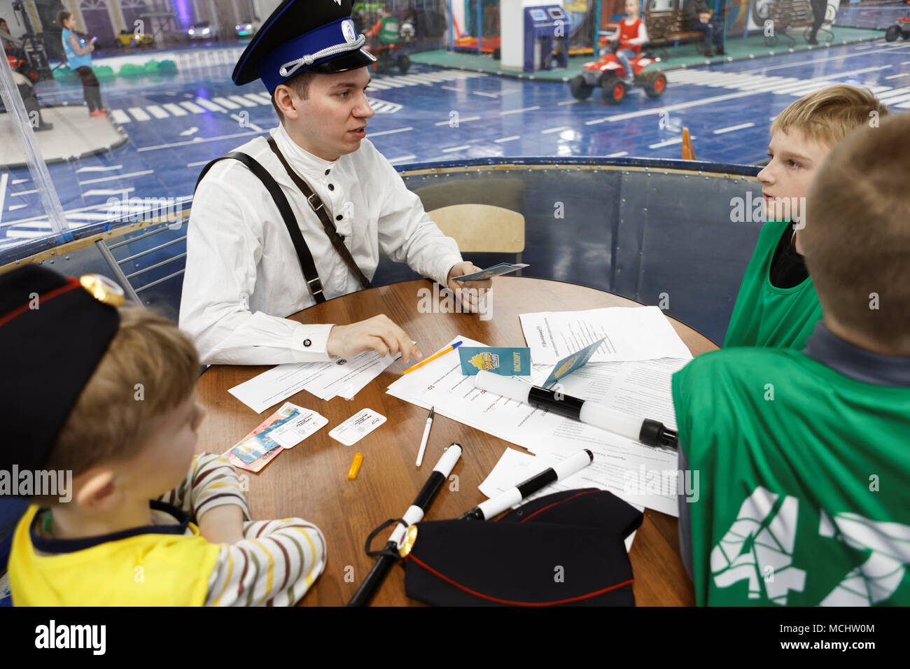 St. Petersburg, Russia - April 5, 2018: Traffic officer issuing driver ...