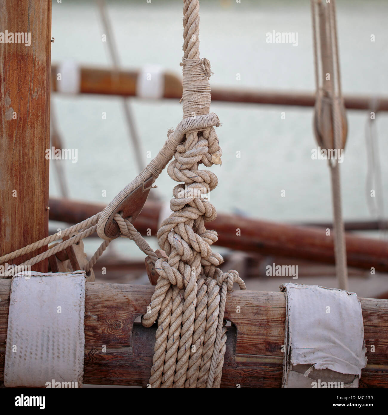 Lashings on the rigging of a sailing dhow in Doha, Qatar Stock Photo ...