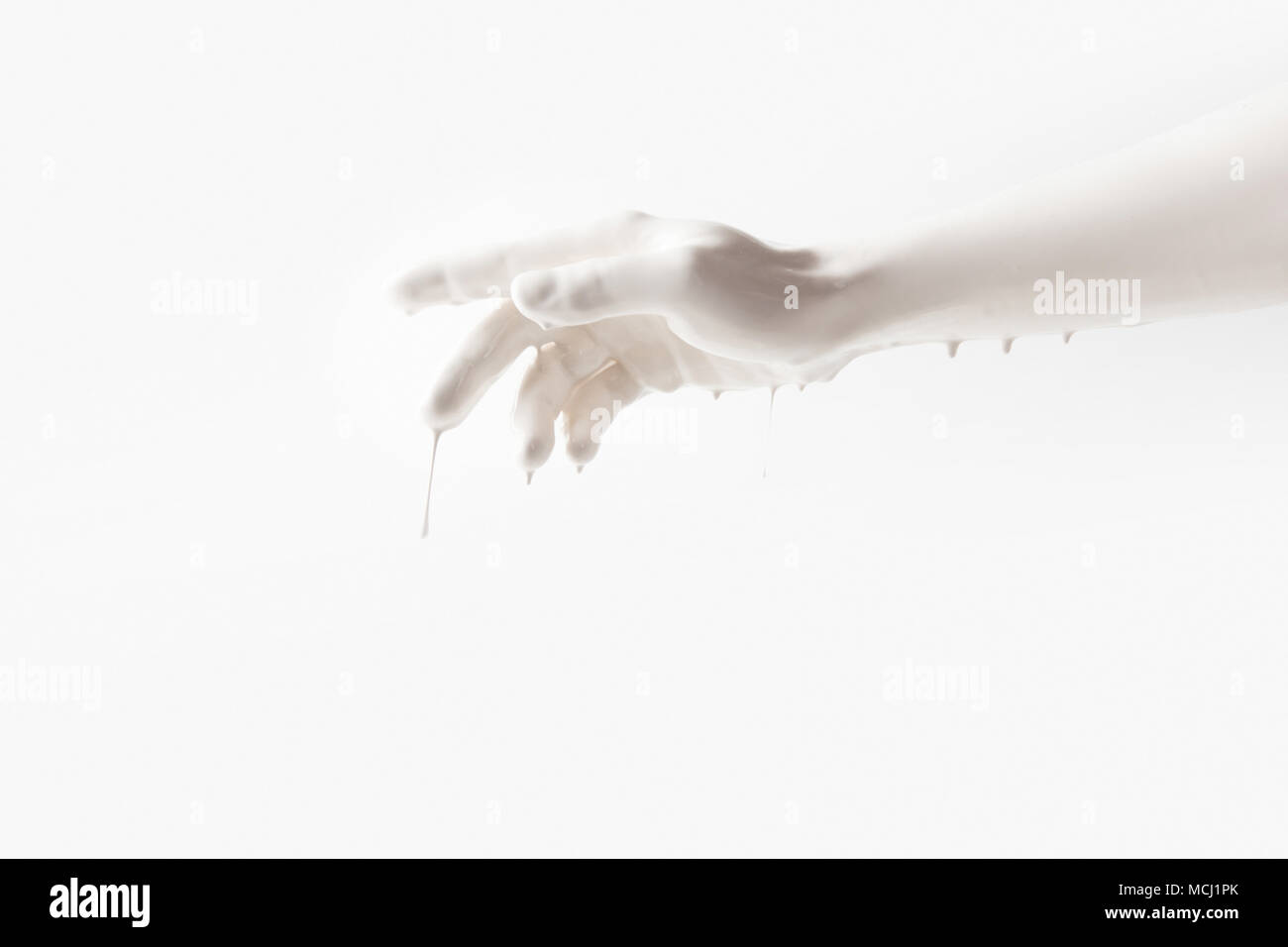 cropped image of female arm in white paint isolated on white Stock ...