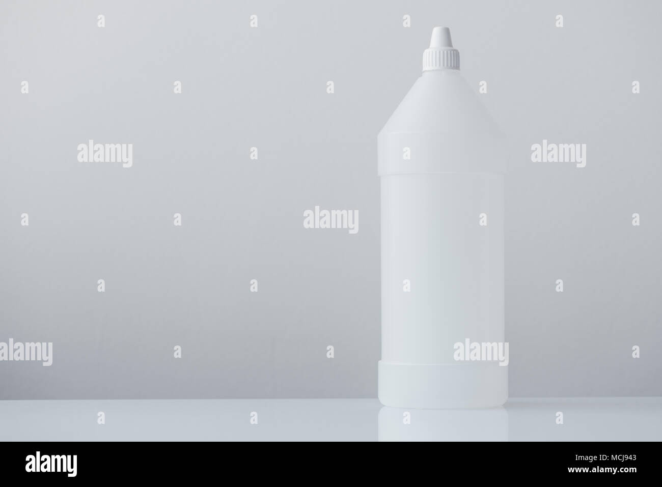 White plastic bottle container for medical ethyl alcohol with blank ...