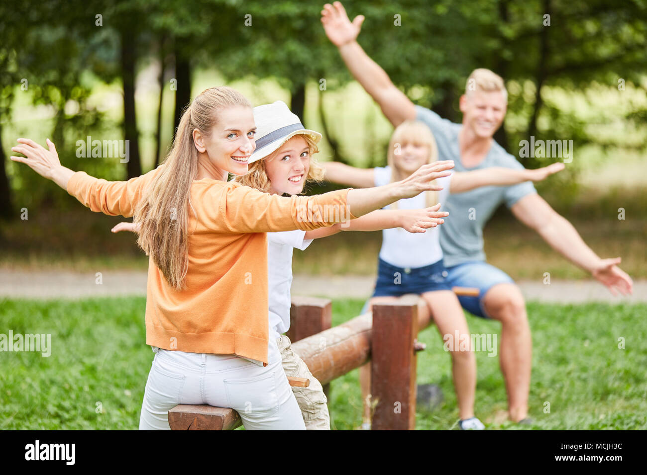 Balancing family hi-res stock photography and images - Alamy