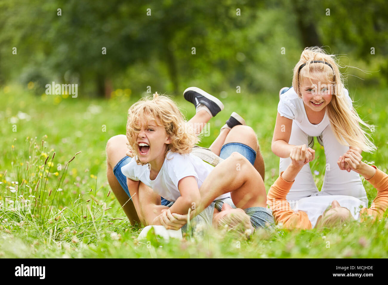 Romp father children hi-res stock photography and images - Alamy