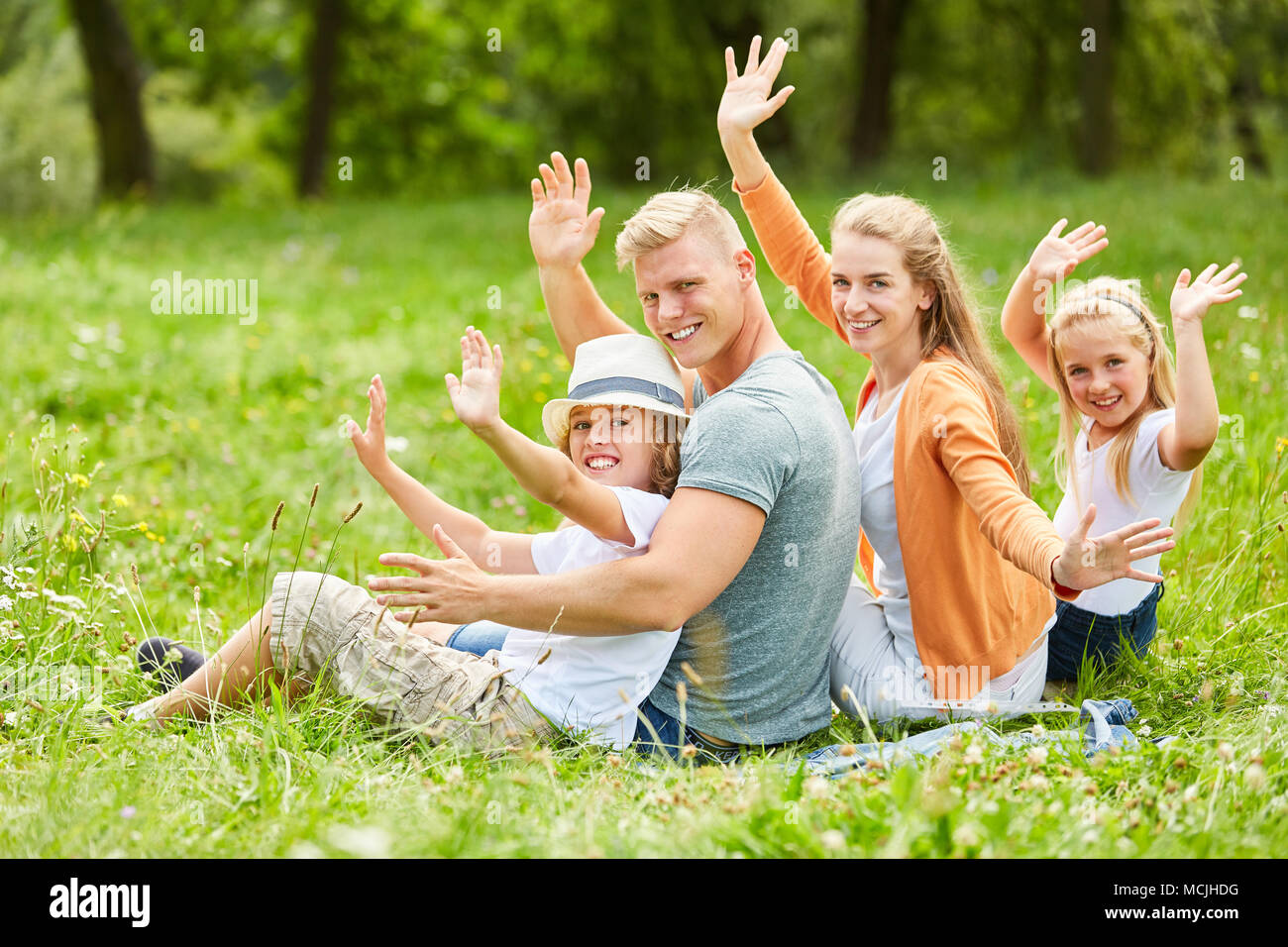 Children waving hello hi-res stock photography and images - Alamy