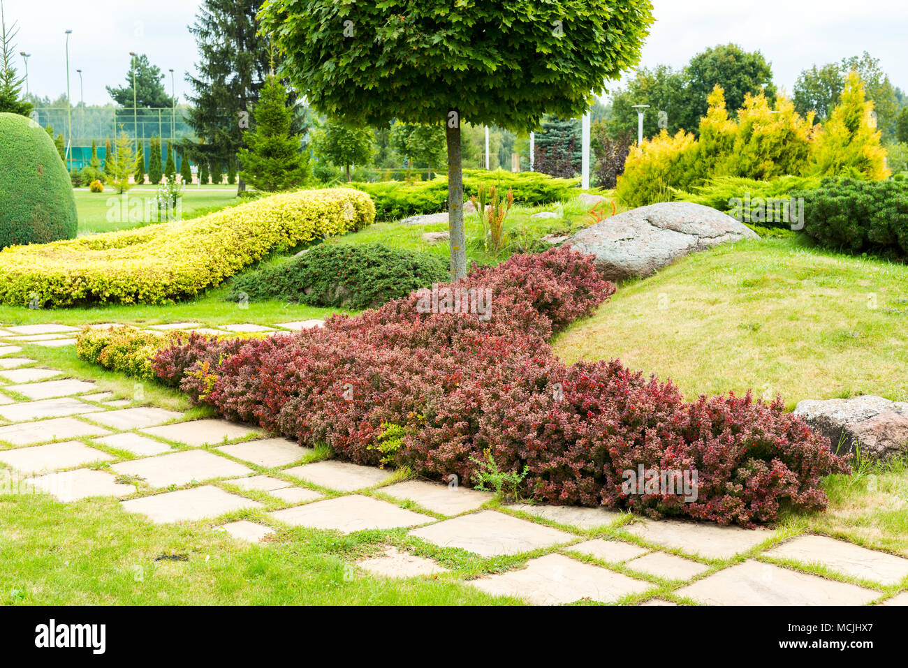 decorated stone paths in landscape design Stock Photo - Alamy