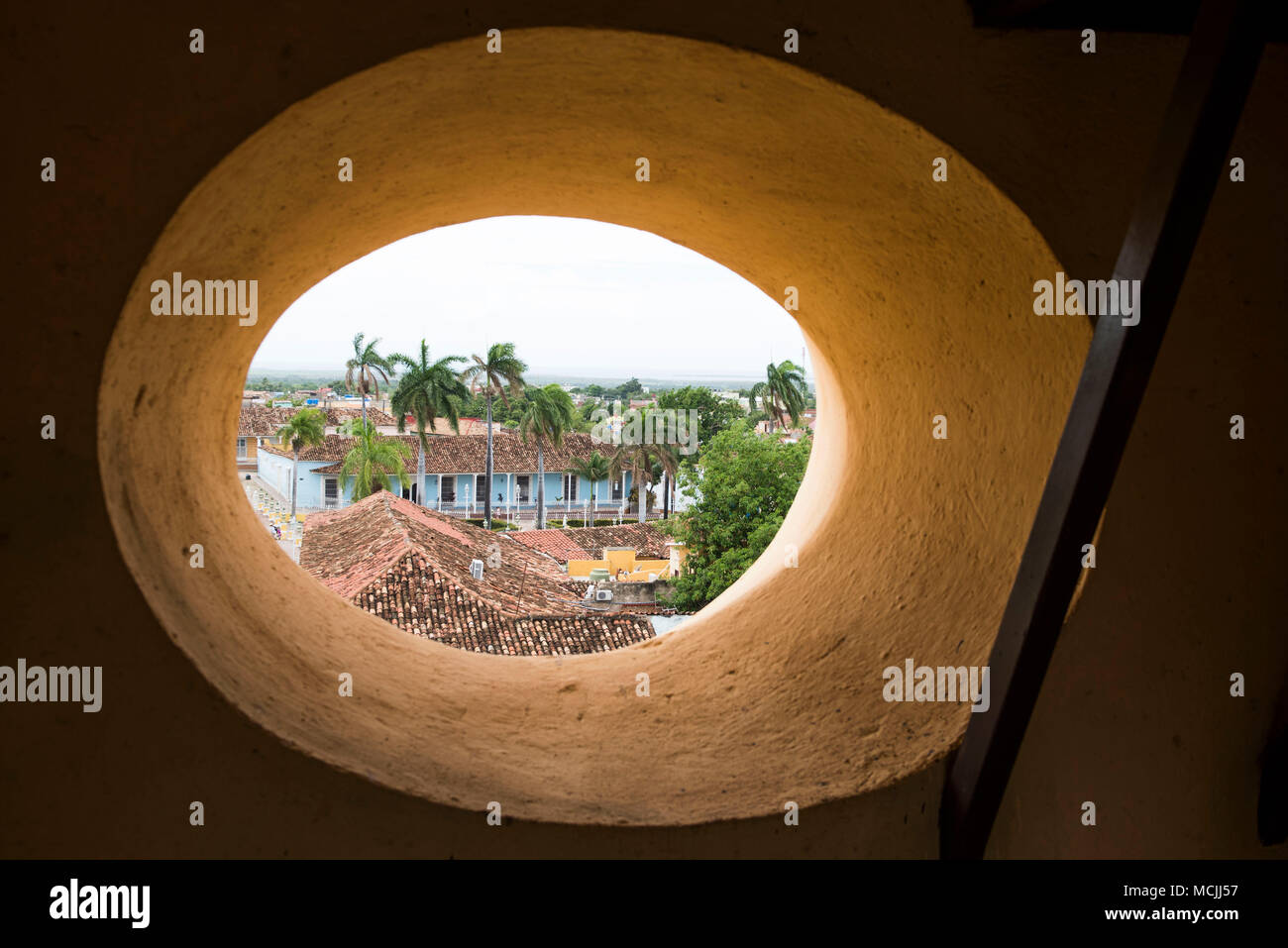 View of Trinidad through an oval window, in Trinidad, Cuba Stock Photo ...