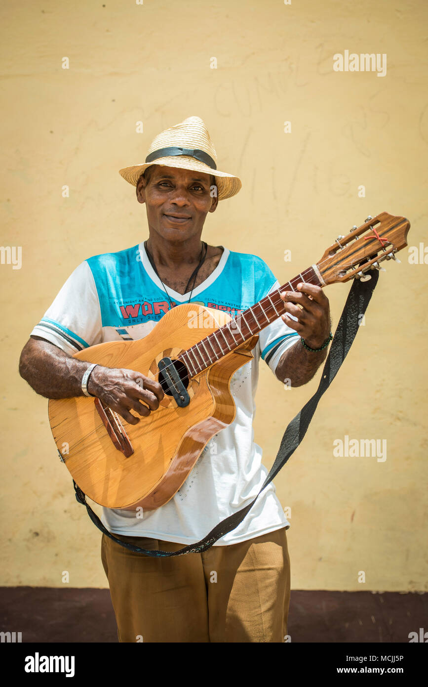 A Cuban musician plays in the street in Trinidad, Cuba Stock Photo - Alamy