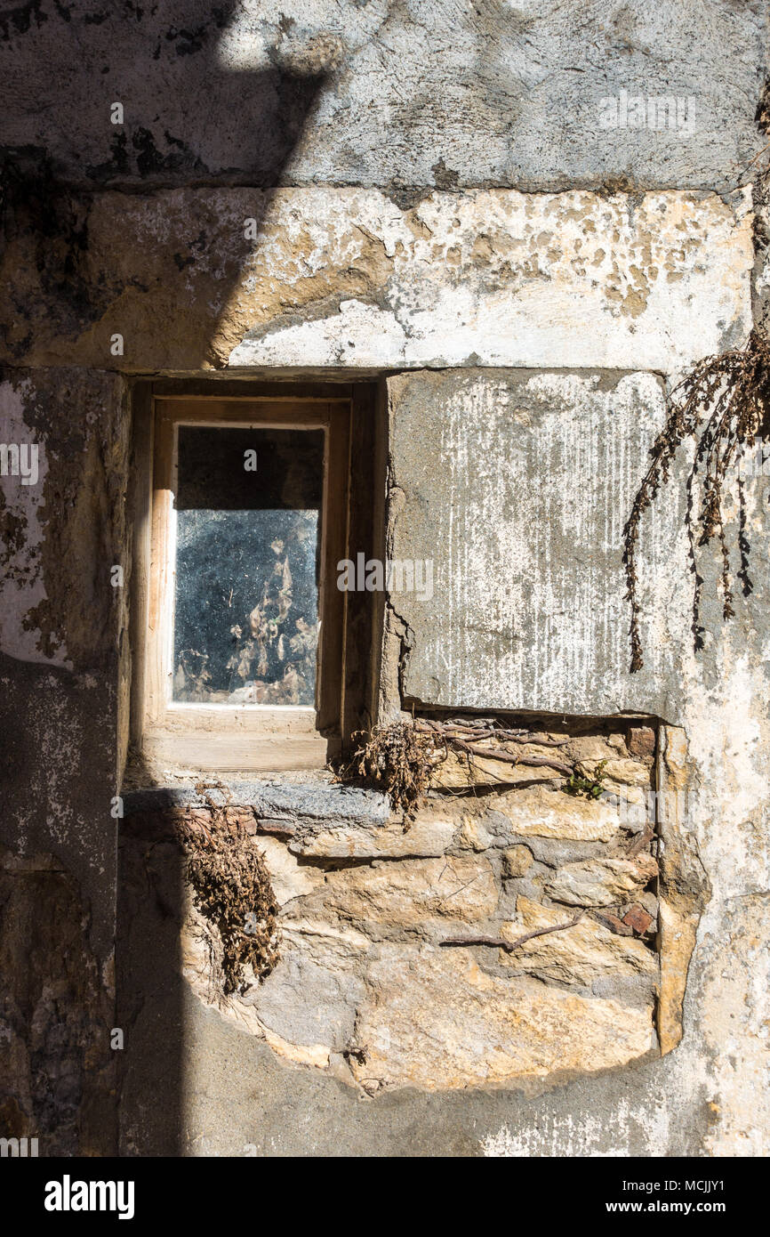 Window of old damaged stone wall Stock Photo - Alamy
