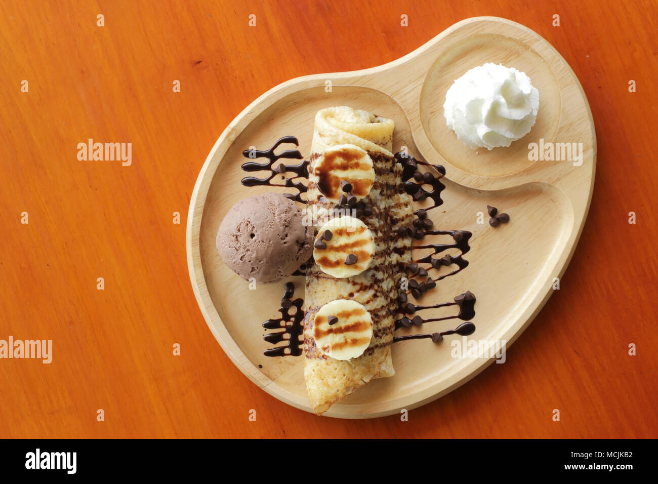 banana cold crepe dessert, crepe with banana and chocolate ice cream ...