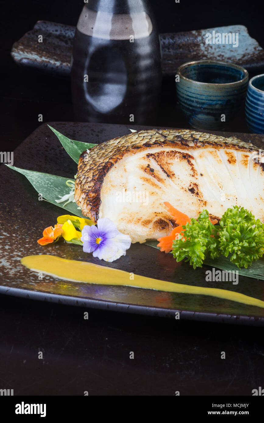 japanese cuisine. fried fish on background Stock Photo - Alamy