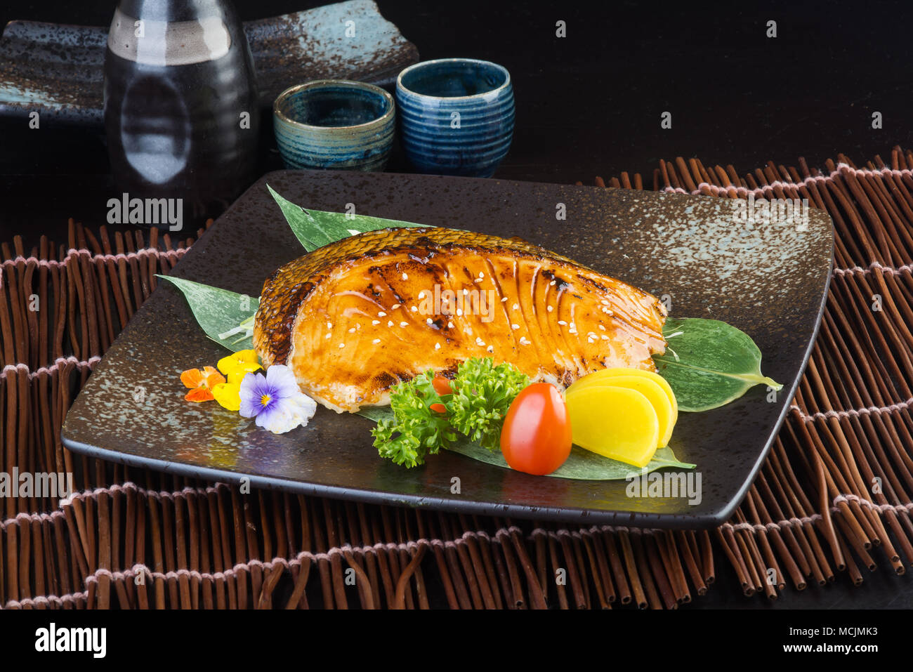 japanese cuisine. fried fish on background Stock Photo - Alamy