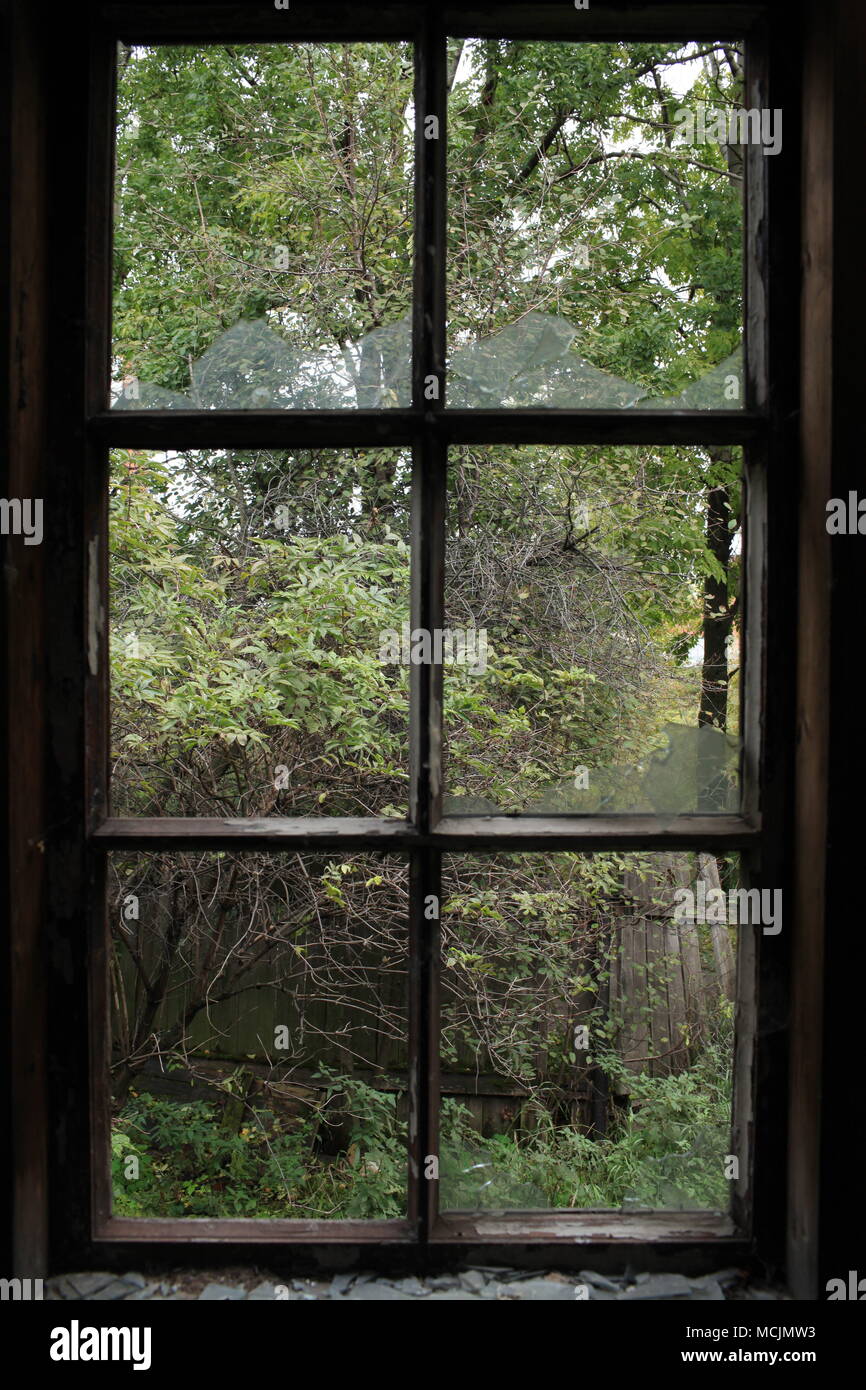 The window with the broken glass inside Stock Photo - Alamy