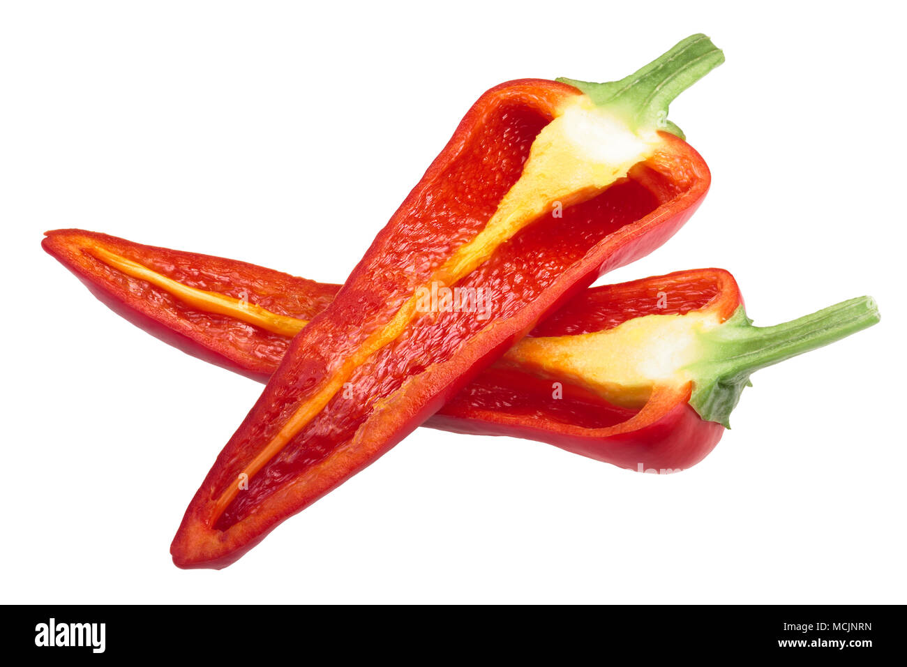 Chimayo chile pepper, a Mexican heirloom, ripe red, crossed pod halves ...