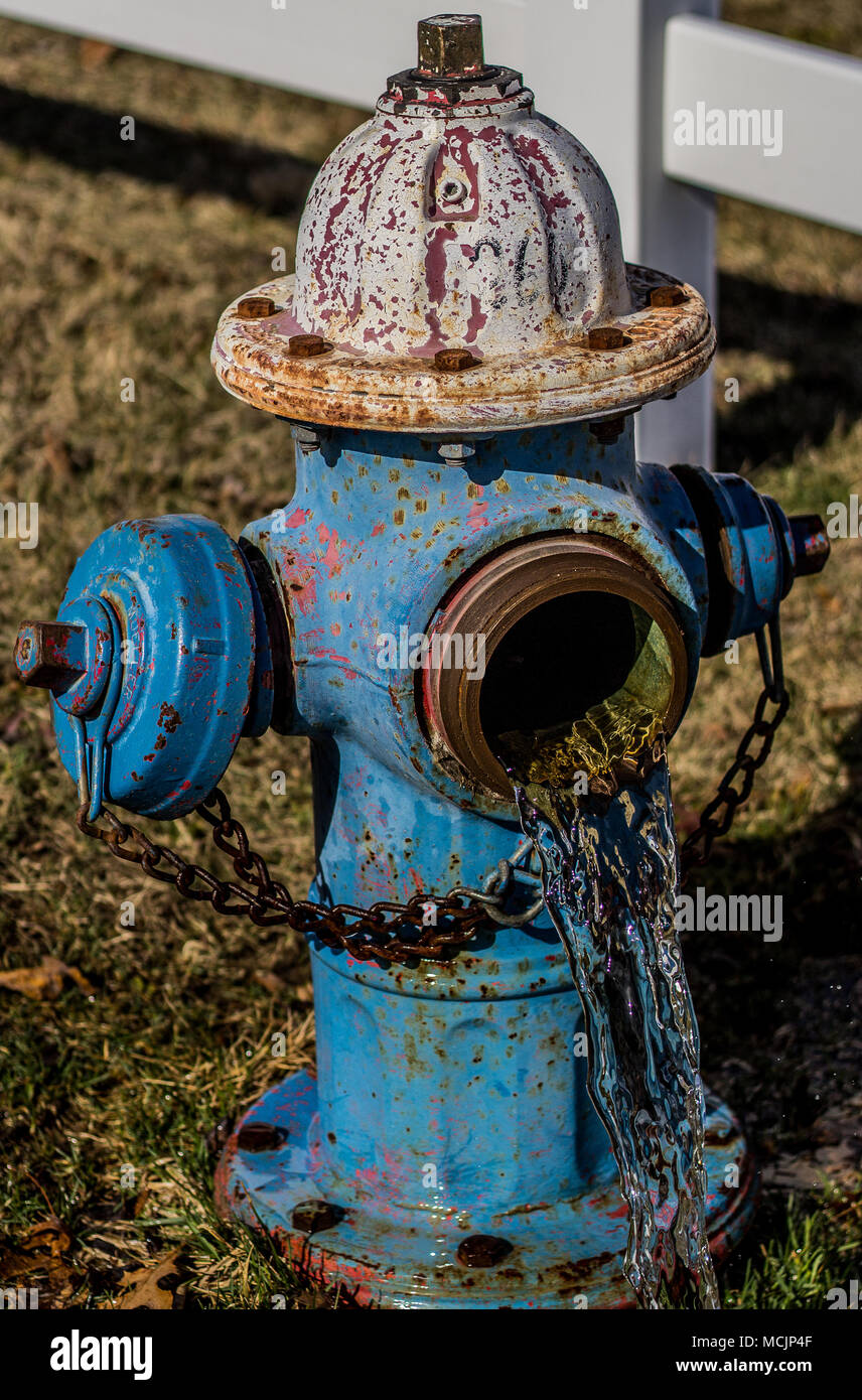 fire hydrant with water flowing Stock Photo - Alamy