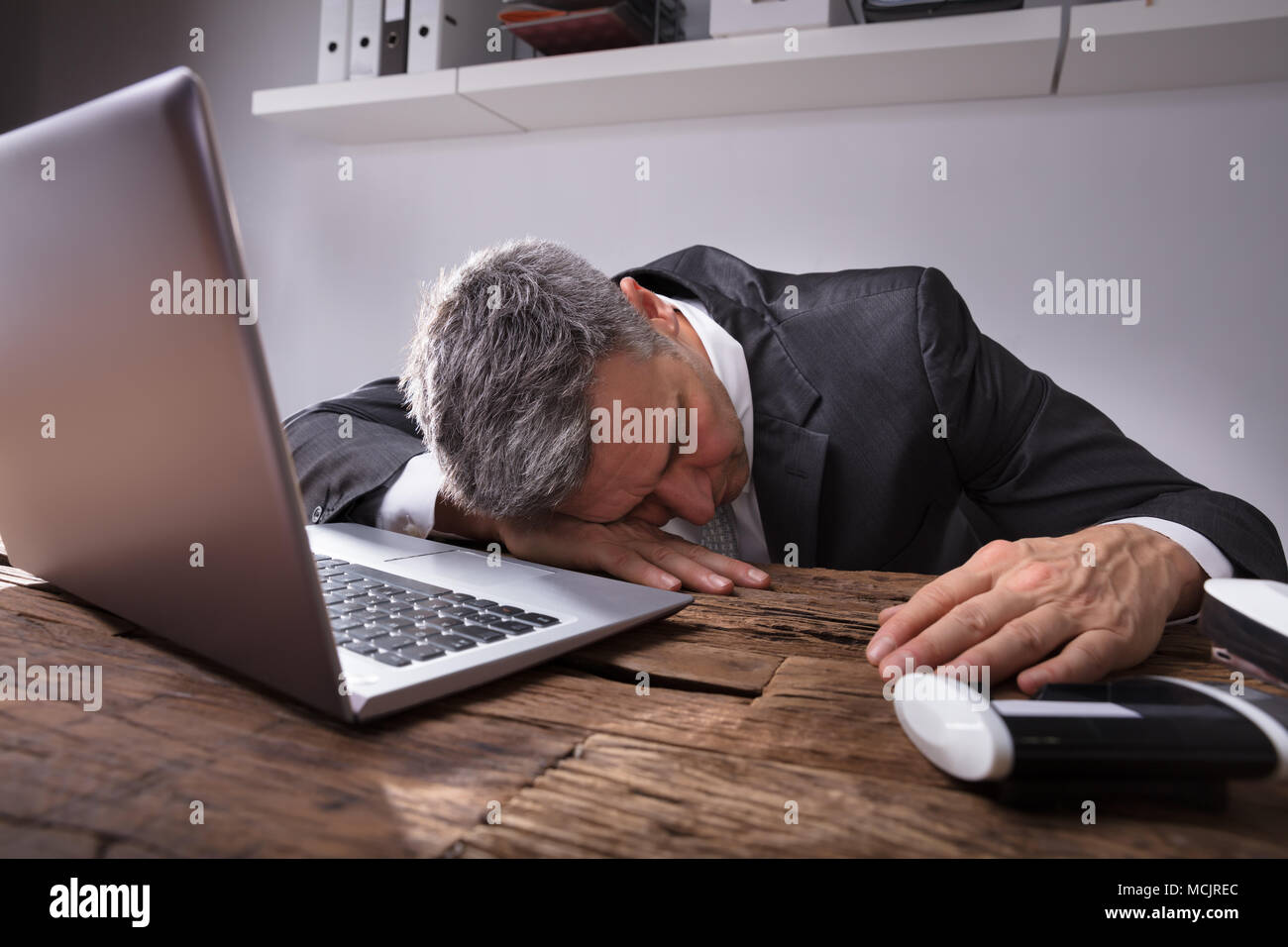 Business man sleeping work hi-res stock photography and images - Alamy