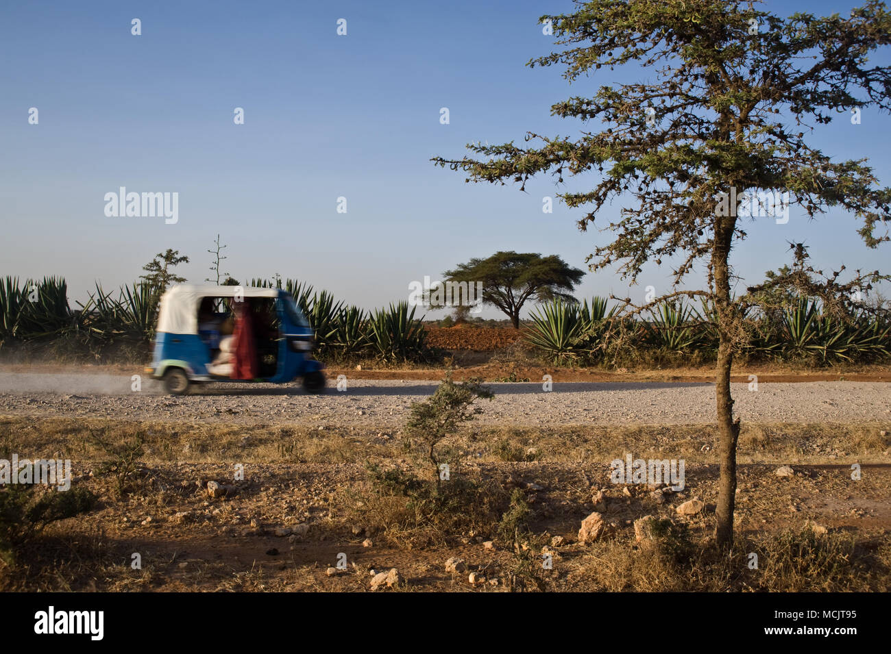 Auto rickshaw carrying goods .It is linking the countryside with the ...