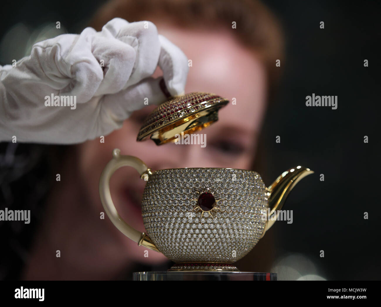 A member of the curatorial team shows off The Egoist in London, ahead ...