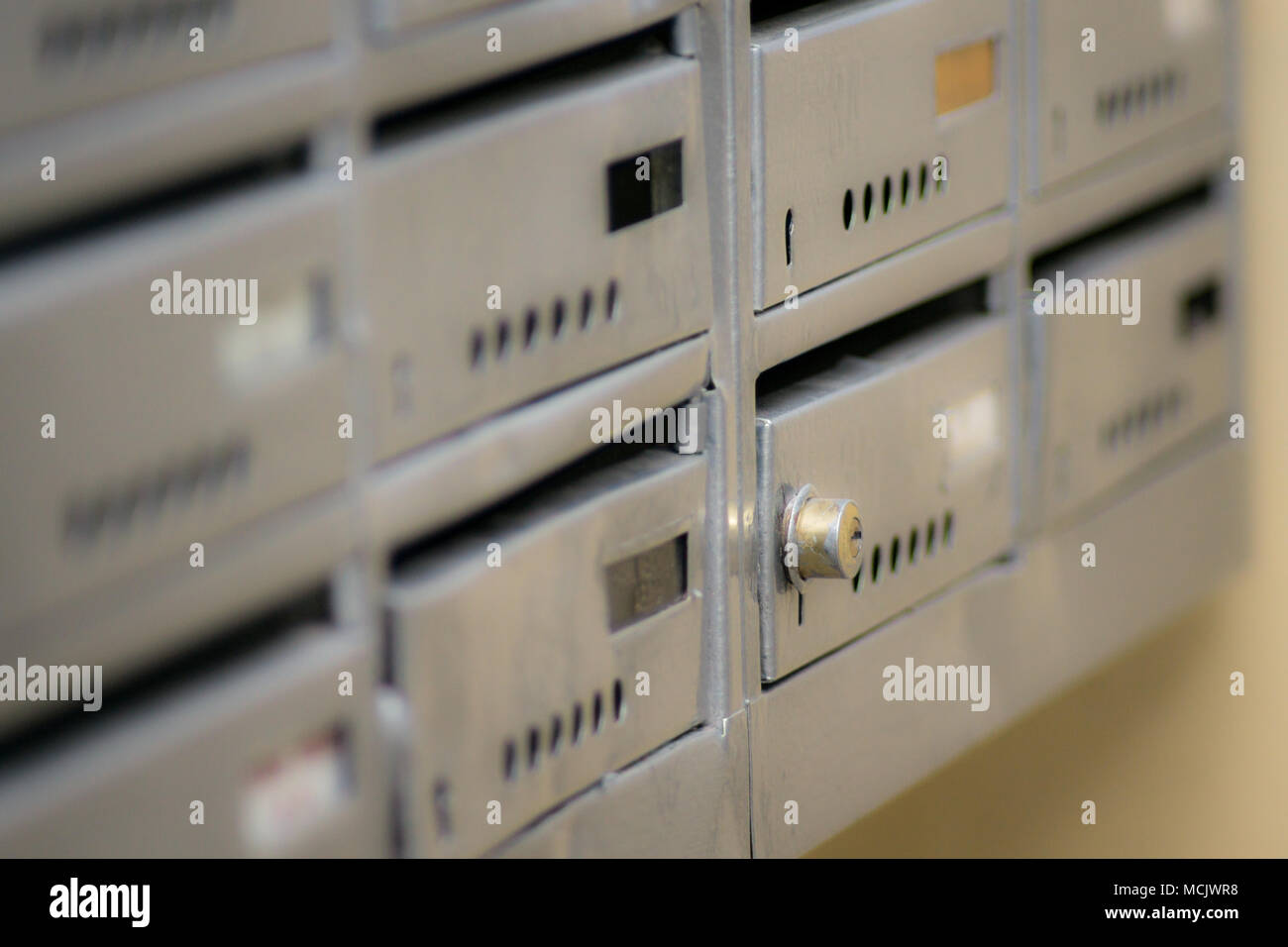 Silver mailbox with locker in focus. Locker on a metal mailbox Stock ...