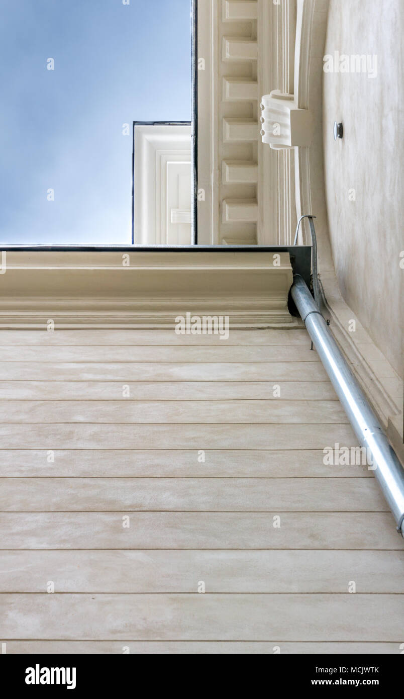 Geometric look from bottom of the building. Bottom view of building ...