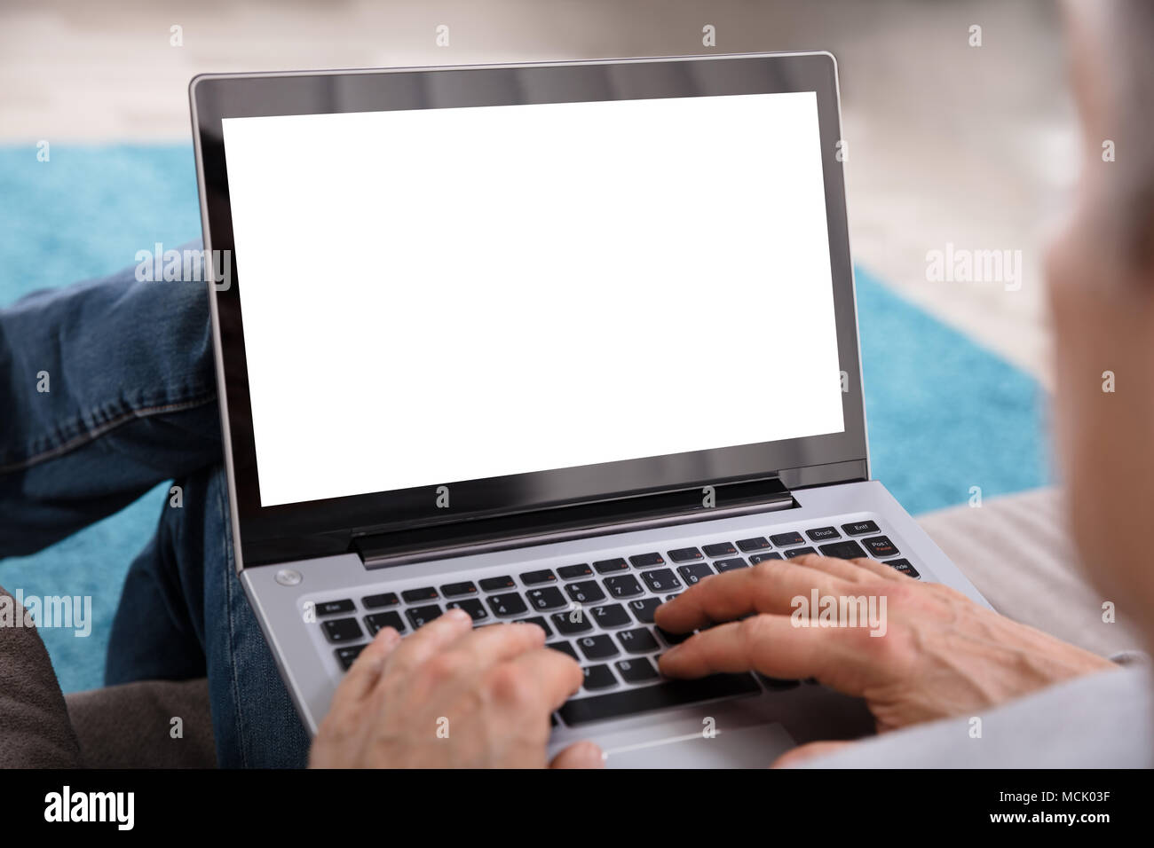 Close-up Of A Person's Hand Using Laptop Showing Blank White Screen ...